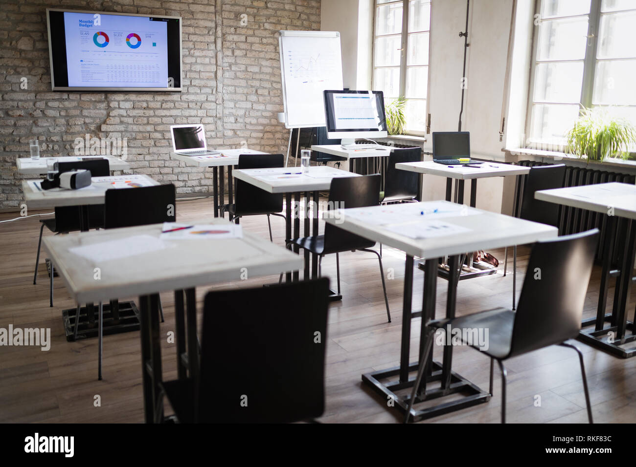 Interior of a modern bright classroom or office Stock Photo - Alamy