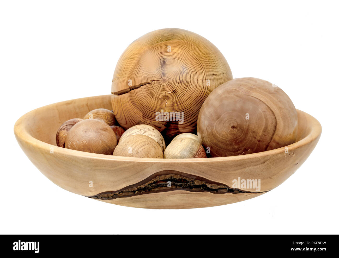 Hand-turned wooden balls in a large bowl isolated on white Stock Photo ...