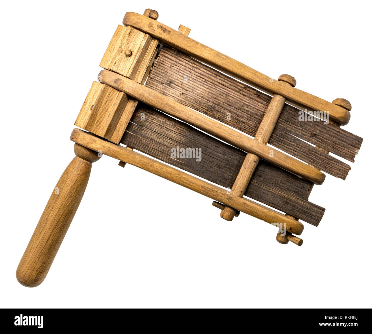 Old handcrafted wooden ratchet / snore isolated on white Stock Photo ...