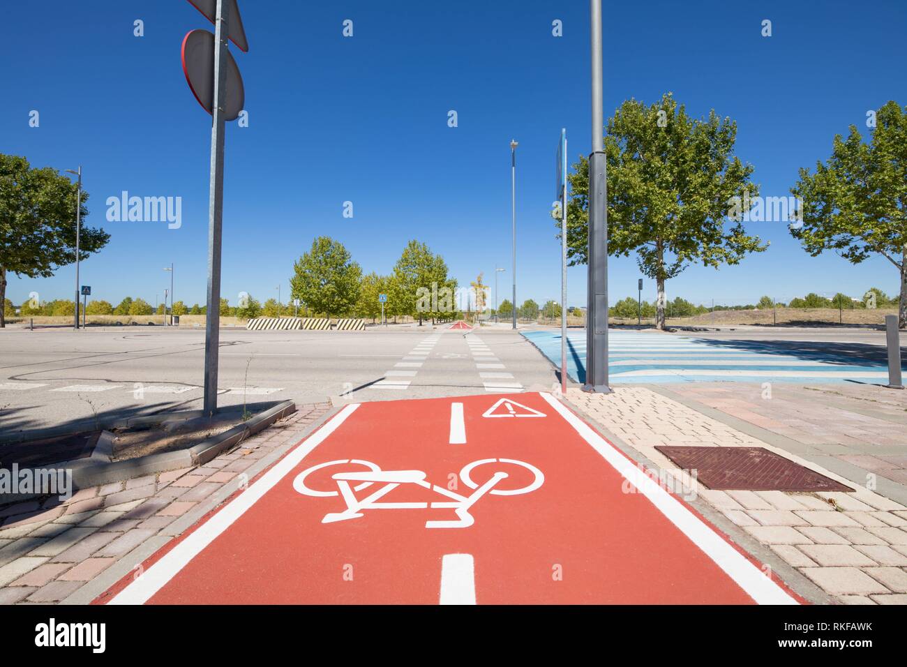 Bicyclist crossing bike lane hi-res stock photography and images - Alamy