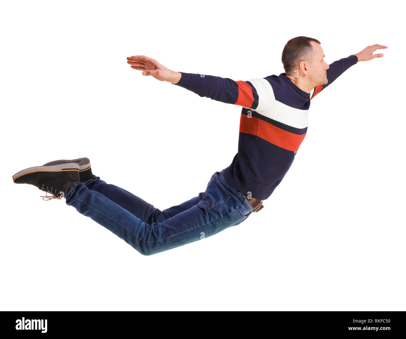 Side view of man in zero gravity or a fall. guy is flying, falling or ...