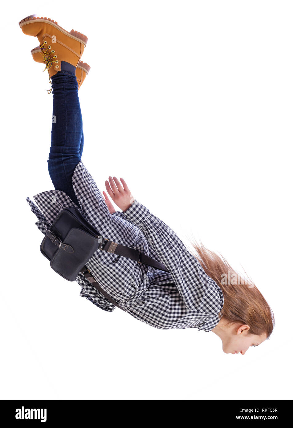 Side view of woman in zero gravity or a fall. girl is flying, falling ...