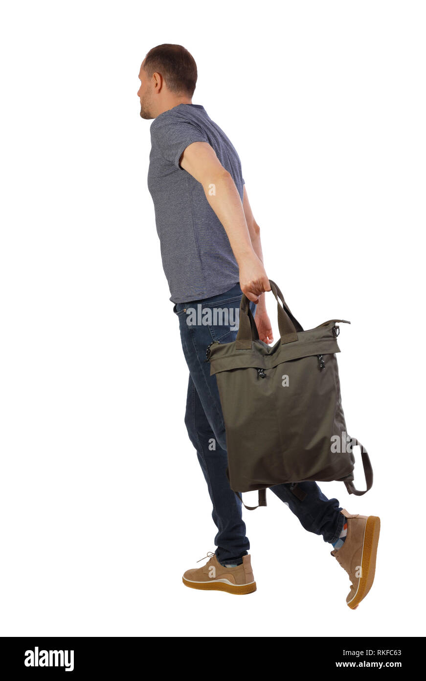 Side view of walking man with green bag. backside view of person. Rear ...