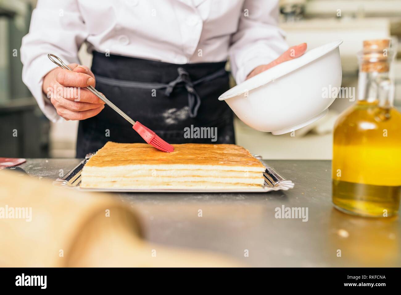 Female cooking in kitchen hi-res stock photography and images - Alamy