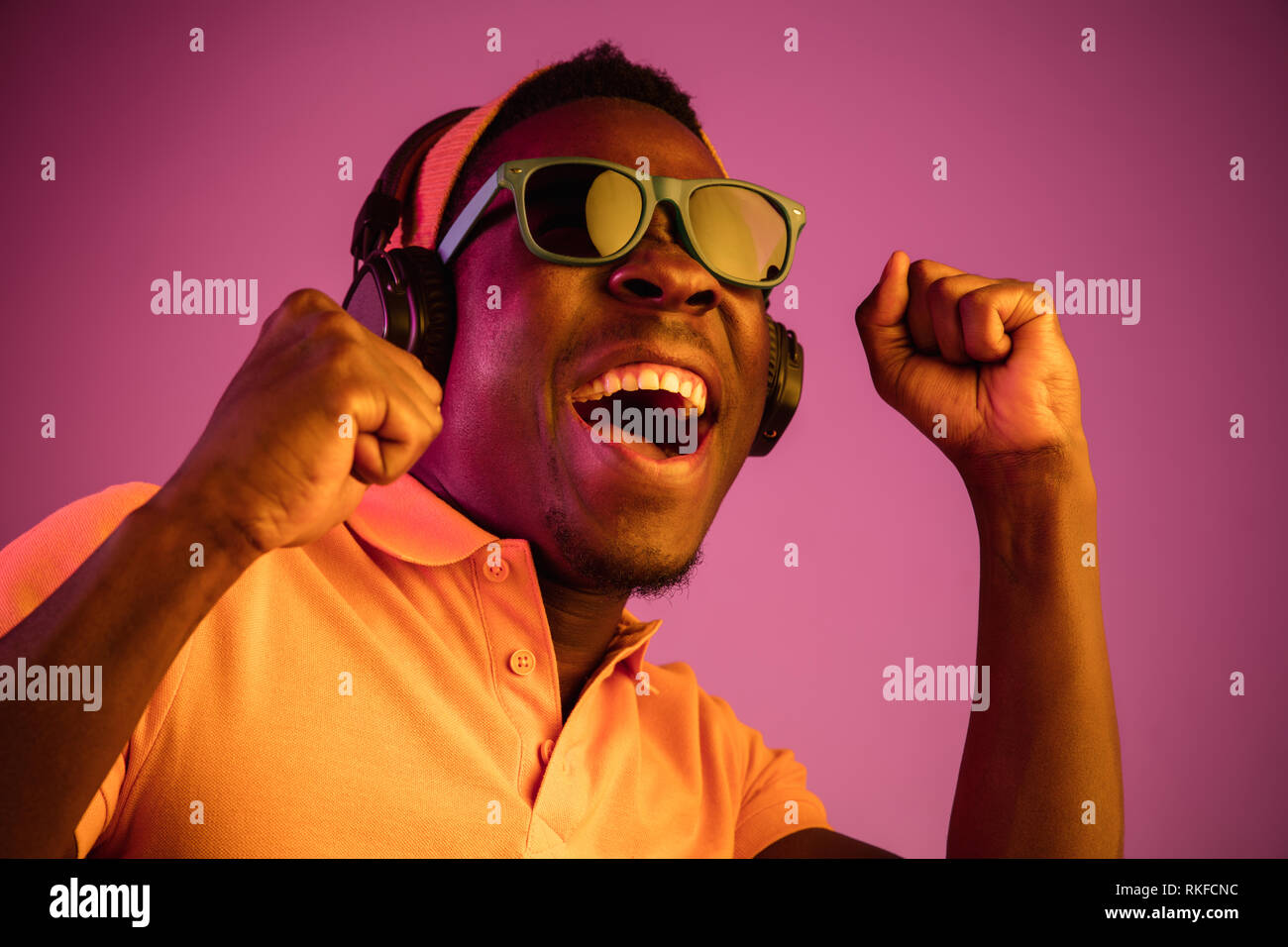 Dancing man earphones studio hi-res stock photography and images - Alamy
