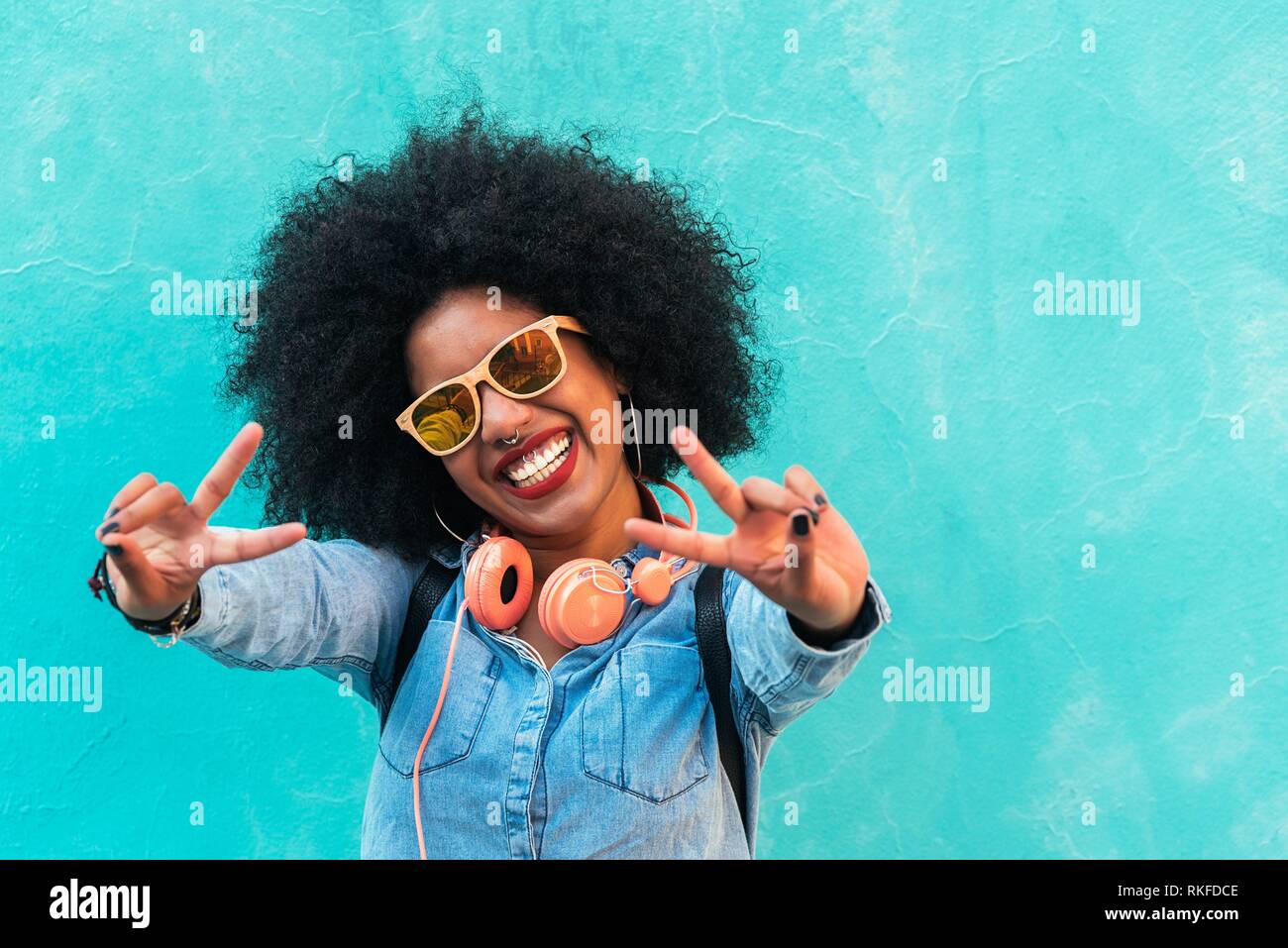 Girl Making Peace Sign High Resolution Stock Photography and Images - Alamy