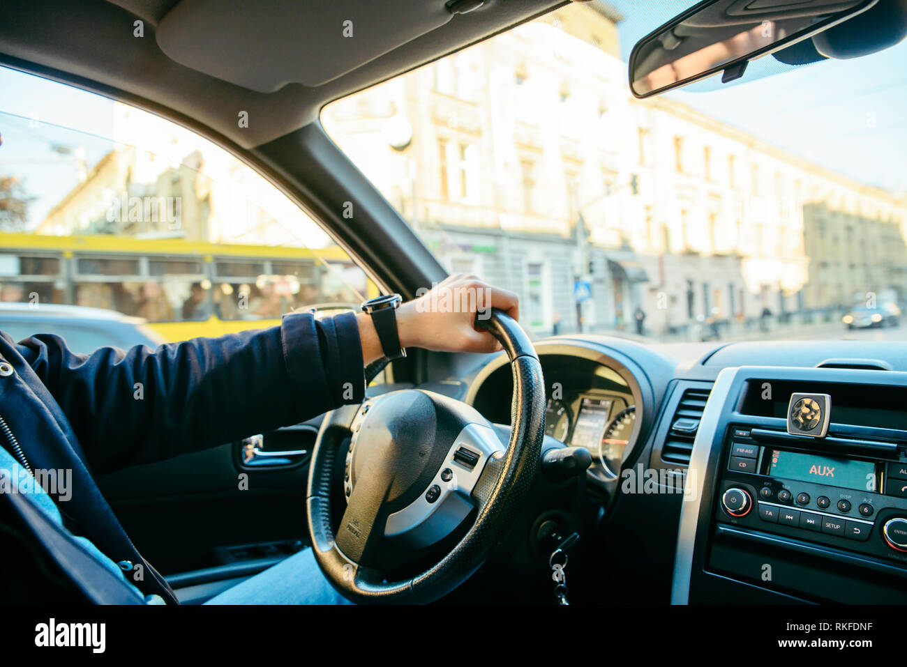 man driving car by city streets. view from inside Stock Photo - Alamy