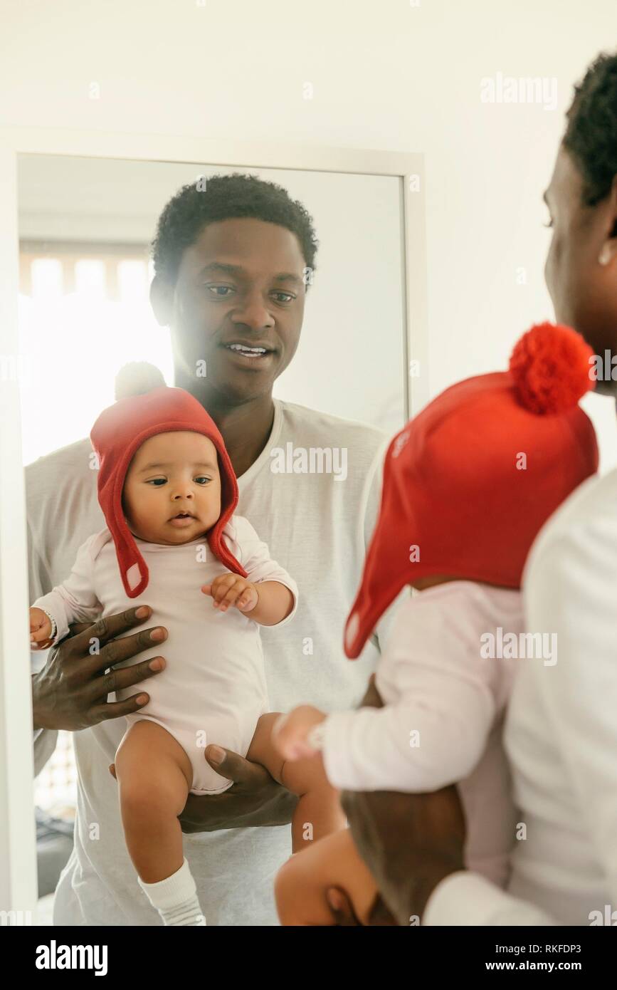 Boy child looking in mirror hi-res stock photography and images - Alamy