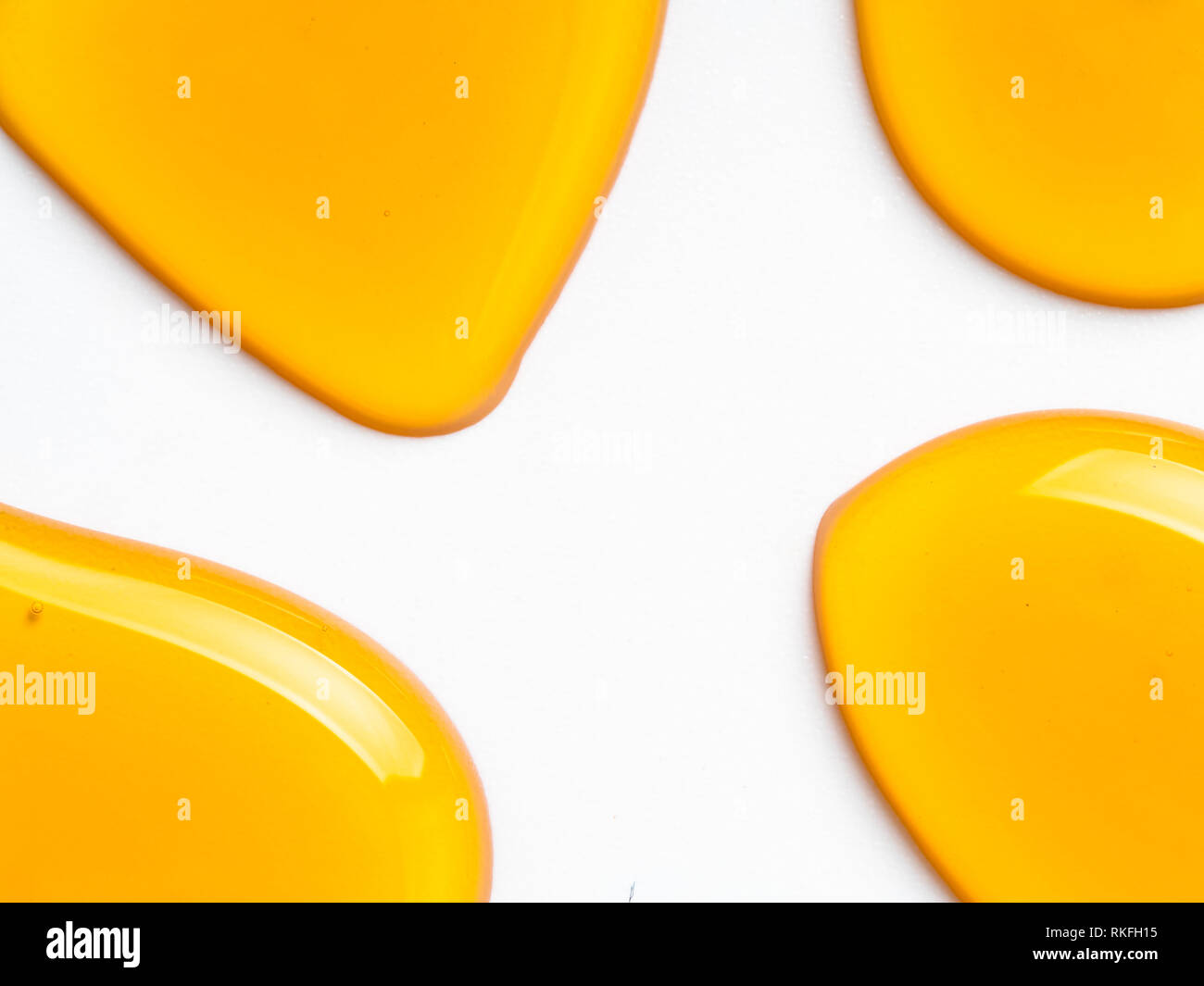 Honey drops. Abstract pattern from honey drops. Isolated on white with ...