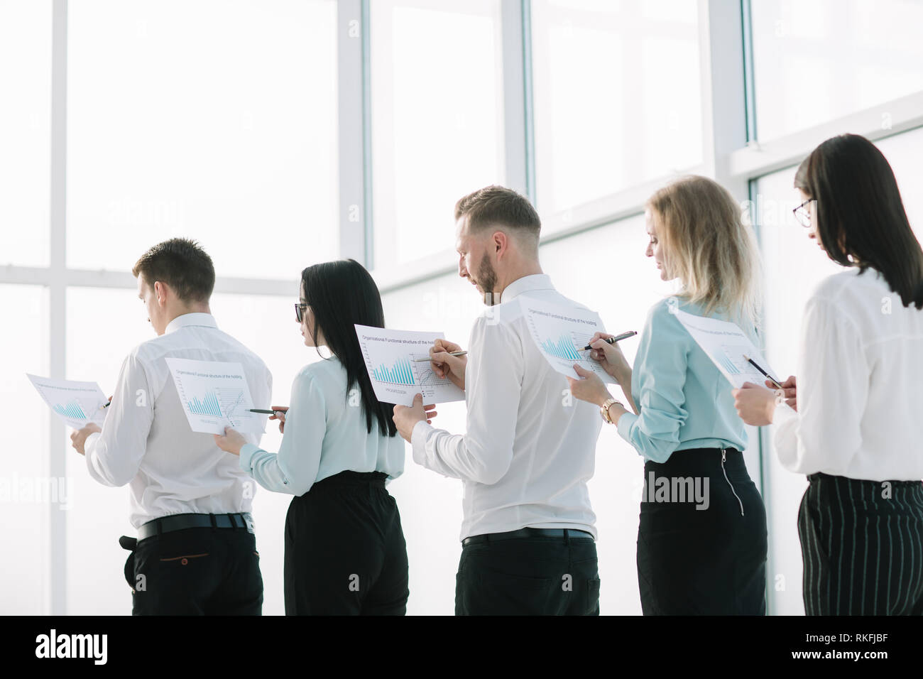 Employees queue up at job hi-res stock photography and images - Alamy