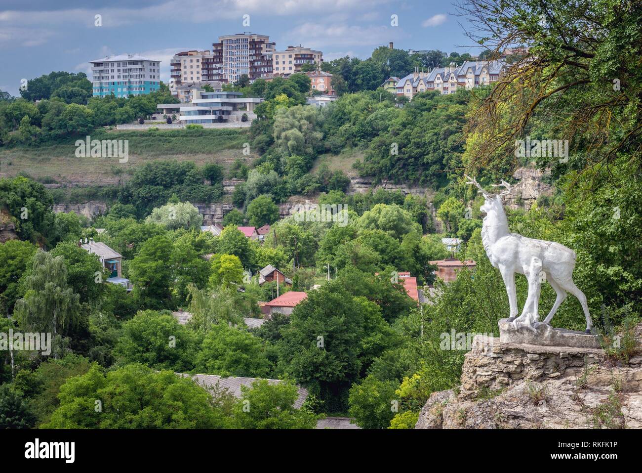 Deer on a rock statue in city park of Kamianets-Podilskyi city in ...