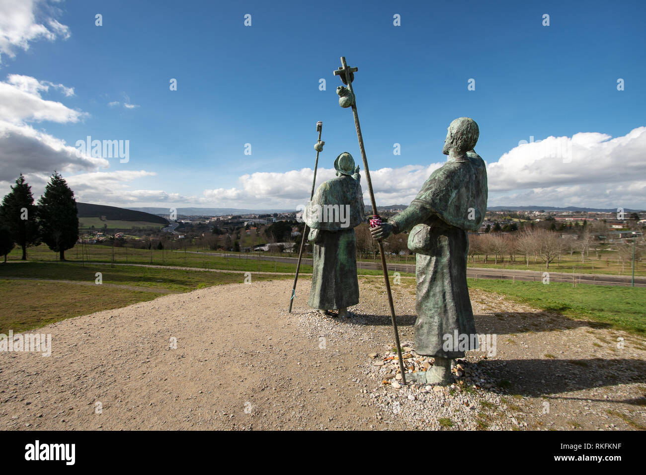 Statues of Pilgrims looking at the cathedral on Monte do Gozo in ...