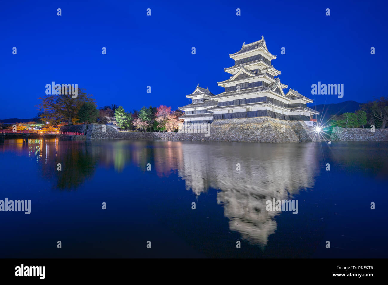 Matsumoto Castle at night with reflection in Nagano, Japan Stock Photo ...