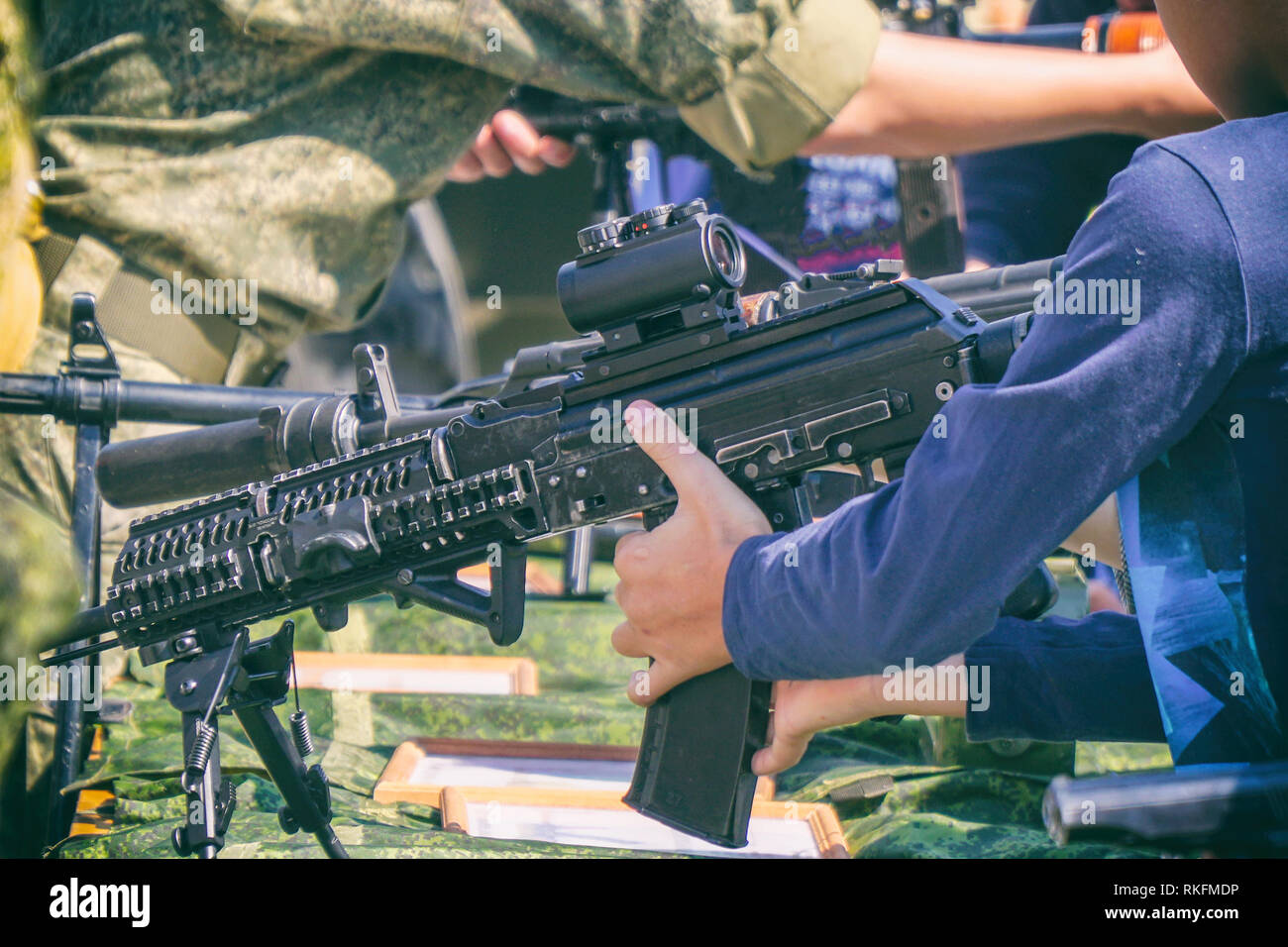 The hands of a hunter holding a rifle hi-res stock photography and ...