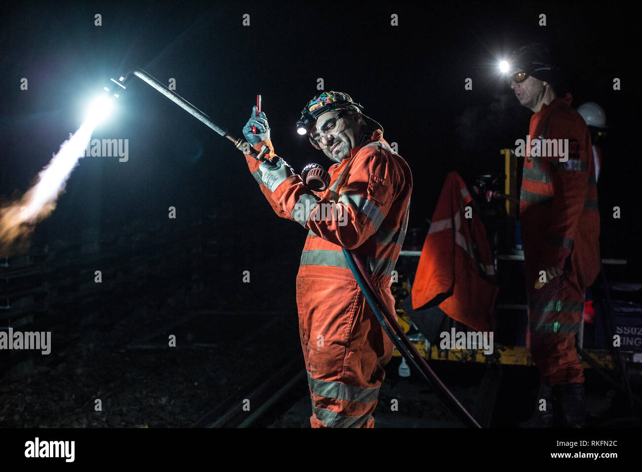 Track renewal engineers working during the night to replace sections of ...