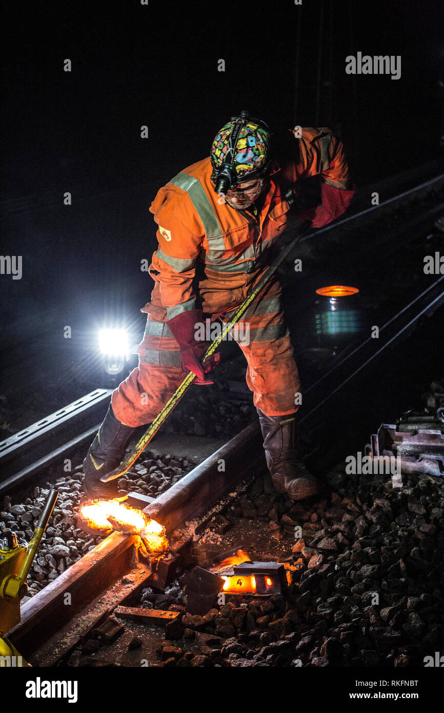 Track renewal engineers working during the night to replace sections of ...