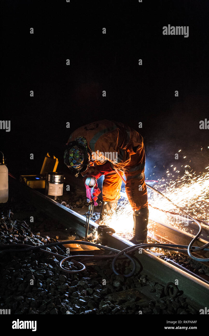 Track renewal engineers working during the night to replace sections of ...