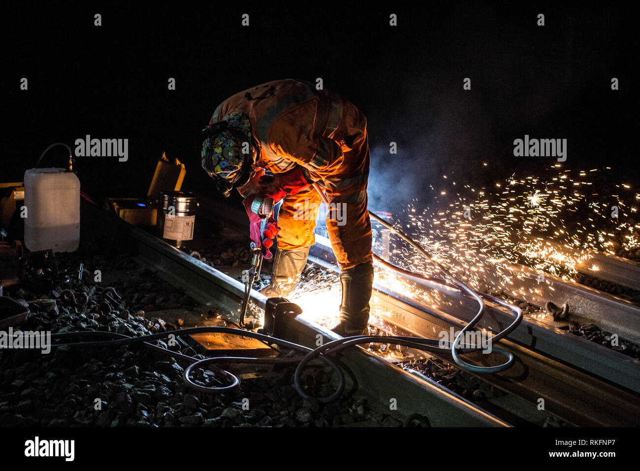 Track renewal engineers working during the night to replace sections of ...