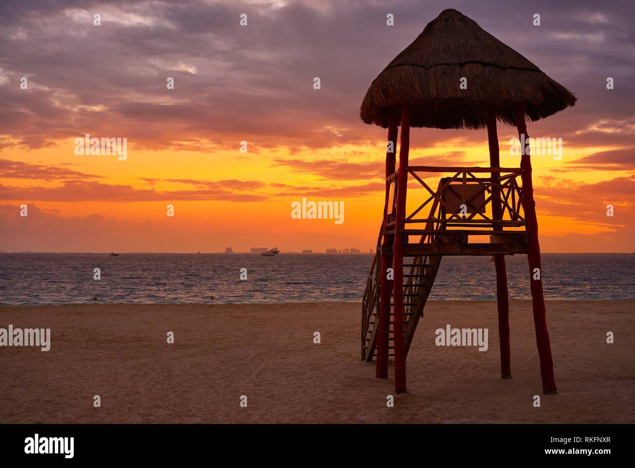 Isla Mujeres island Caribbean beach sunset baywatch tower Riviera Maya ...
