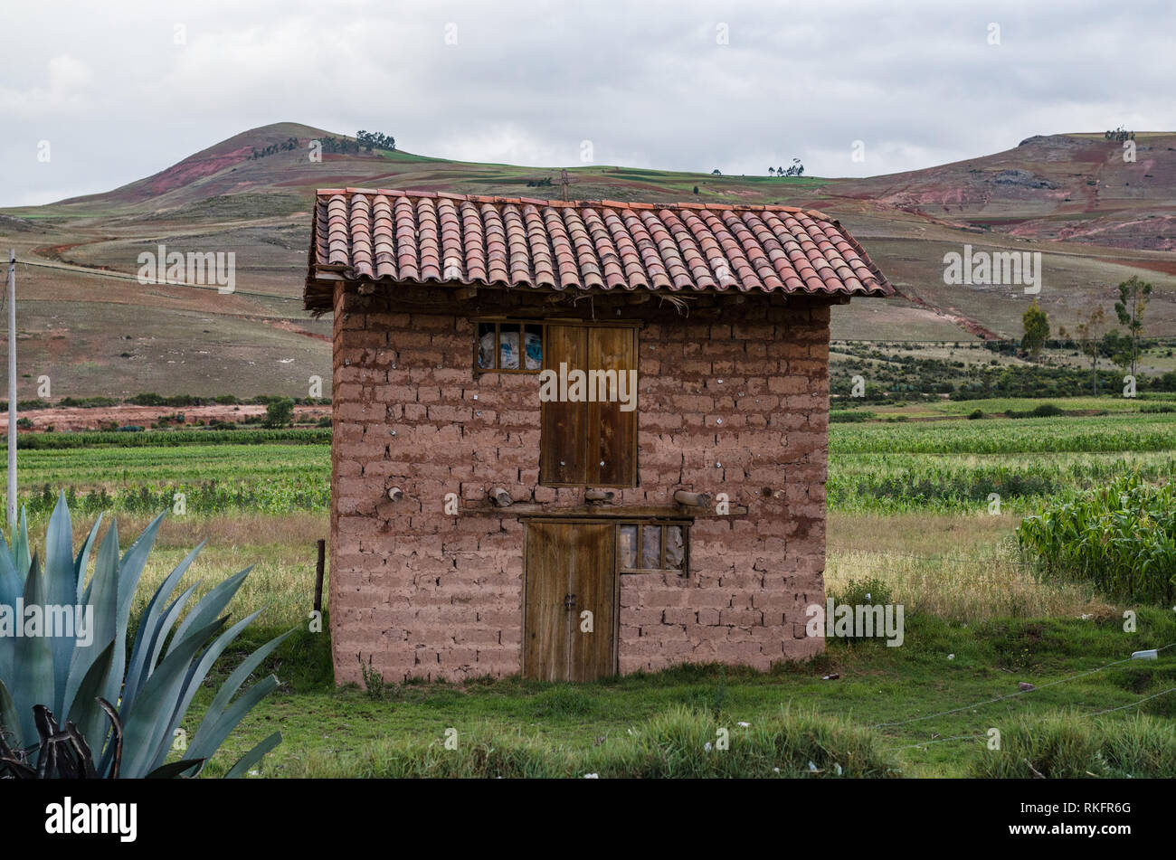 Adobe house near the architectural place of Moray, Cusco, Peru Stock ...