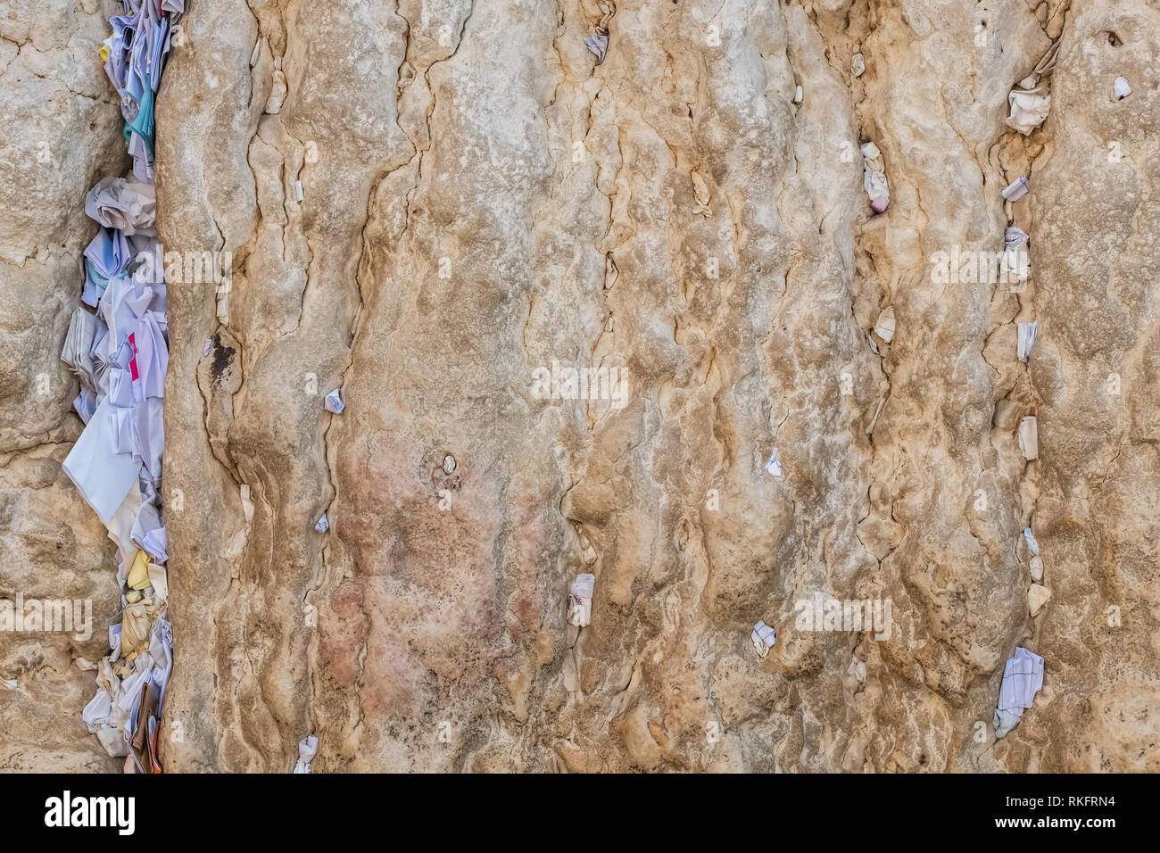 Notes to God in the cracks between the bricks of the Western Wall in ...
