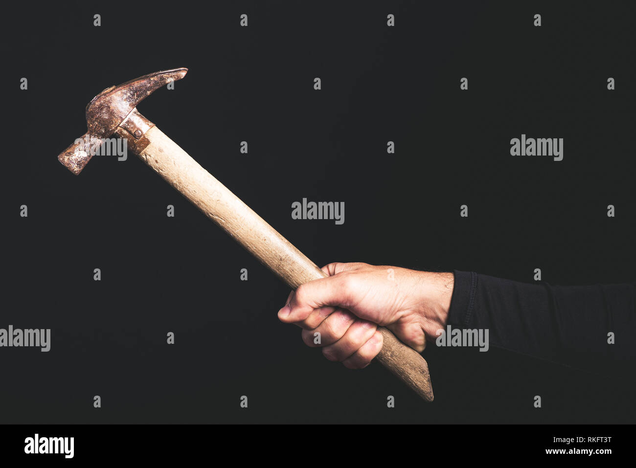 hammer - tools in a man hand - maintenance service concept Stock Photo ...