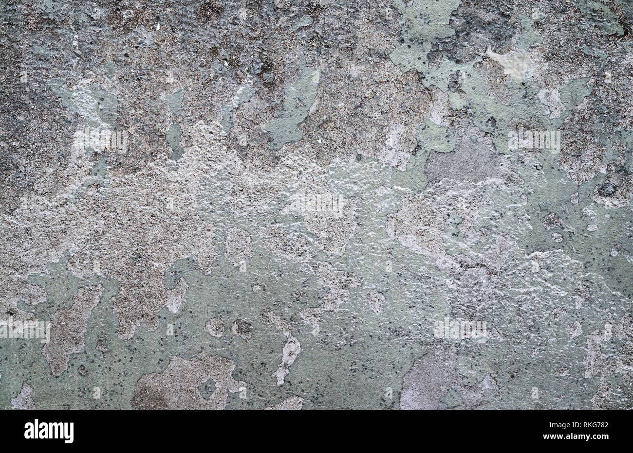 Close up shot of cracks in aged weathered cement walls in high ...