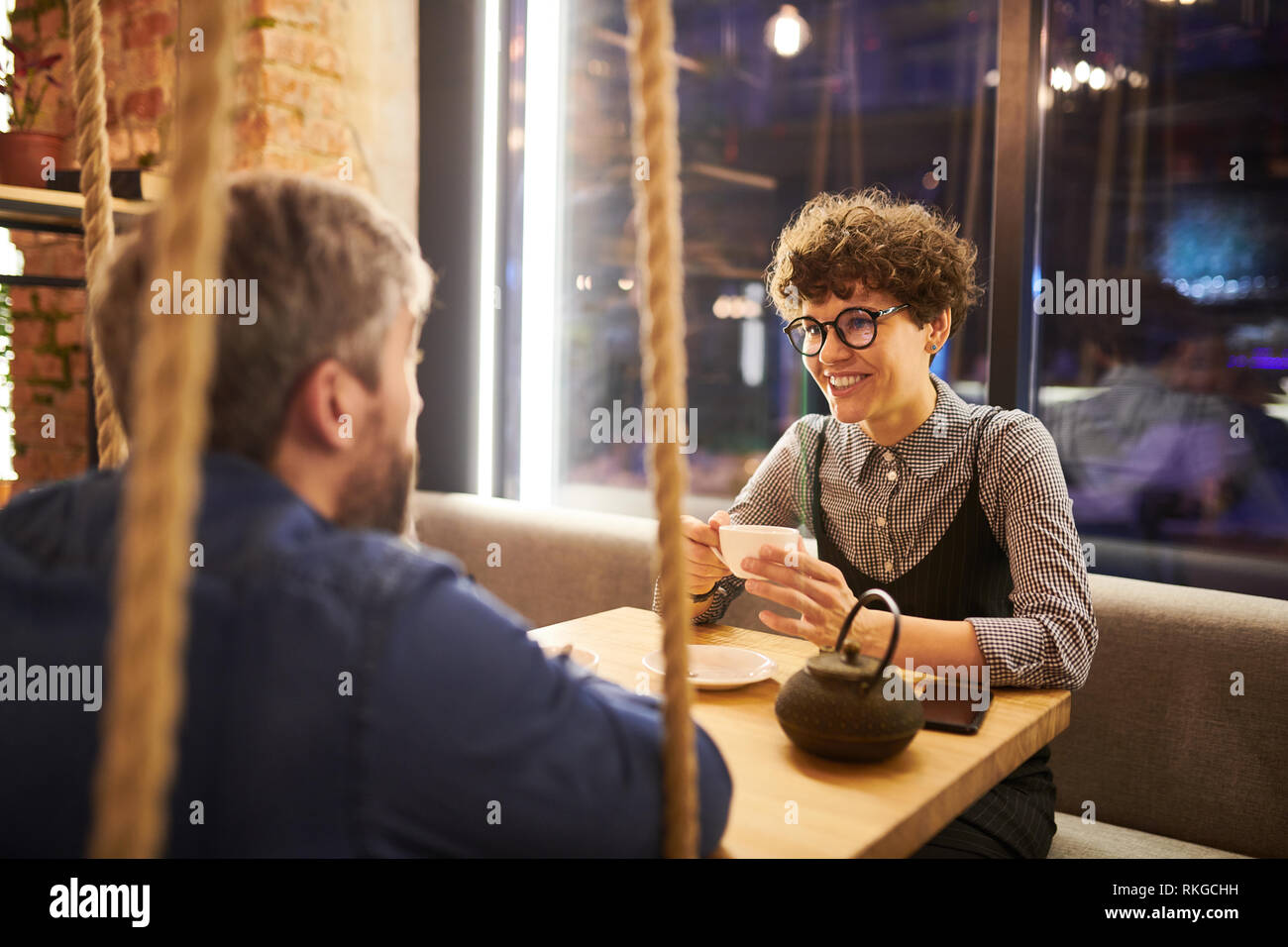 Having tea in cafe Stock Photo - Alamy