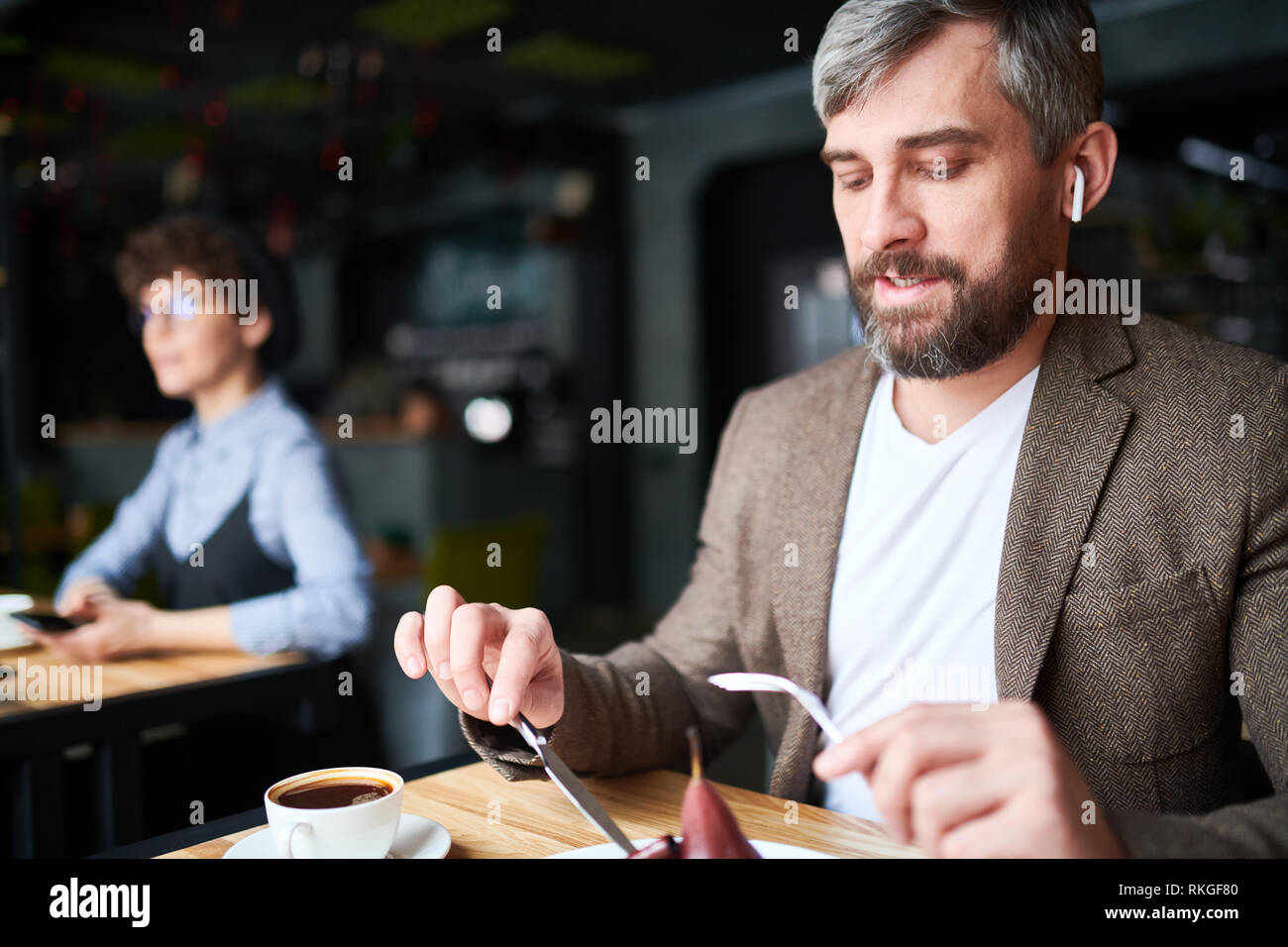 Man eating dessert Stock Photo - Alamy