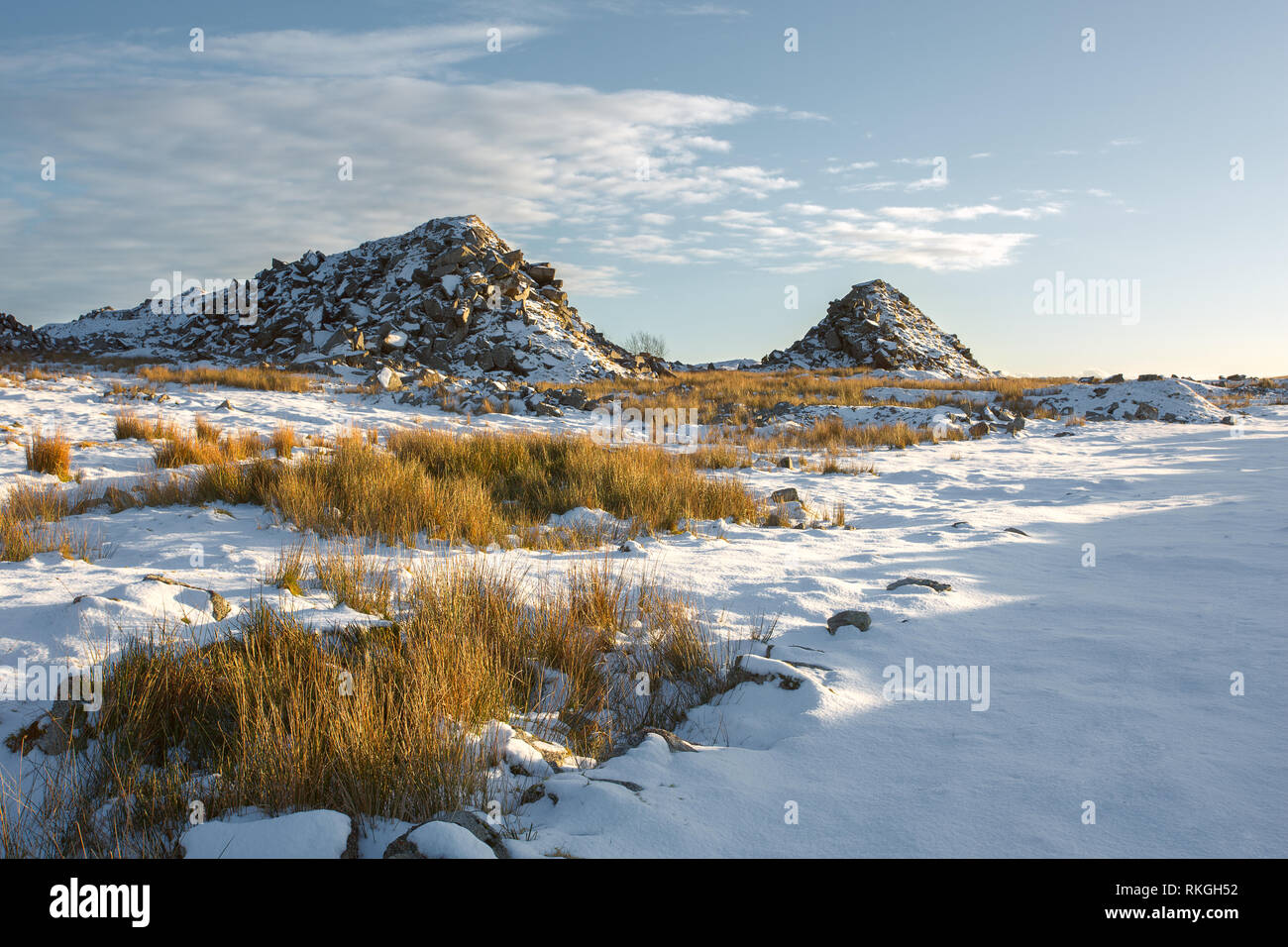 Waste granite piles at Foggintor Quarry in winter Dartmoor national ...