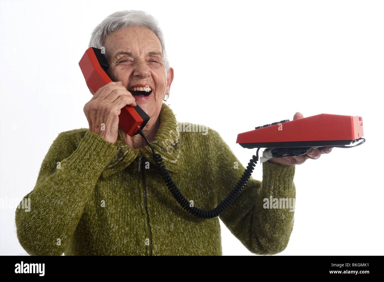 Person on old dial telephone hi-res stock photography and images - Alamy
