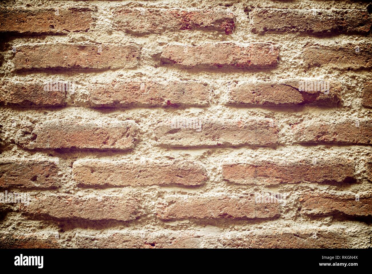 Background created with a old brick wall Stock Photo - Alamy