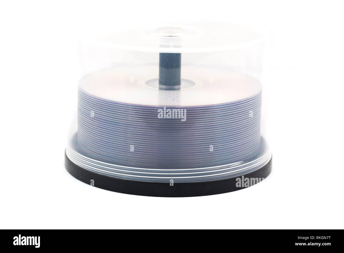 DVD or CD case full of disc media against an isolated white background ...