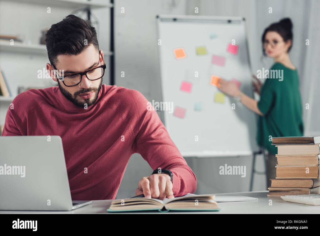 Bearded man reading book hi-res stock photography and images - Alamy