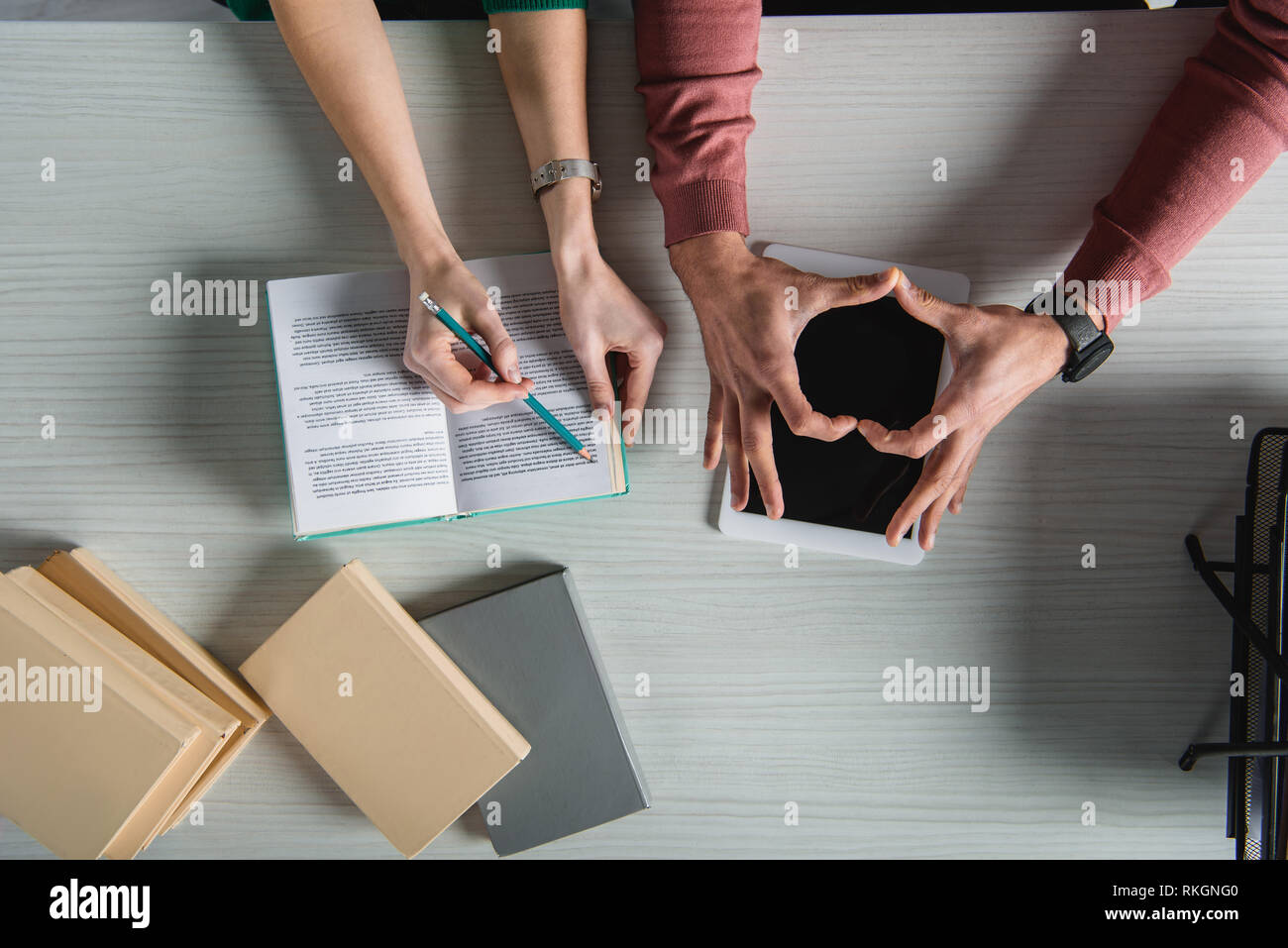 Hands pointing book hi-res stock photography and images - Alamy