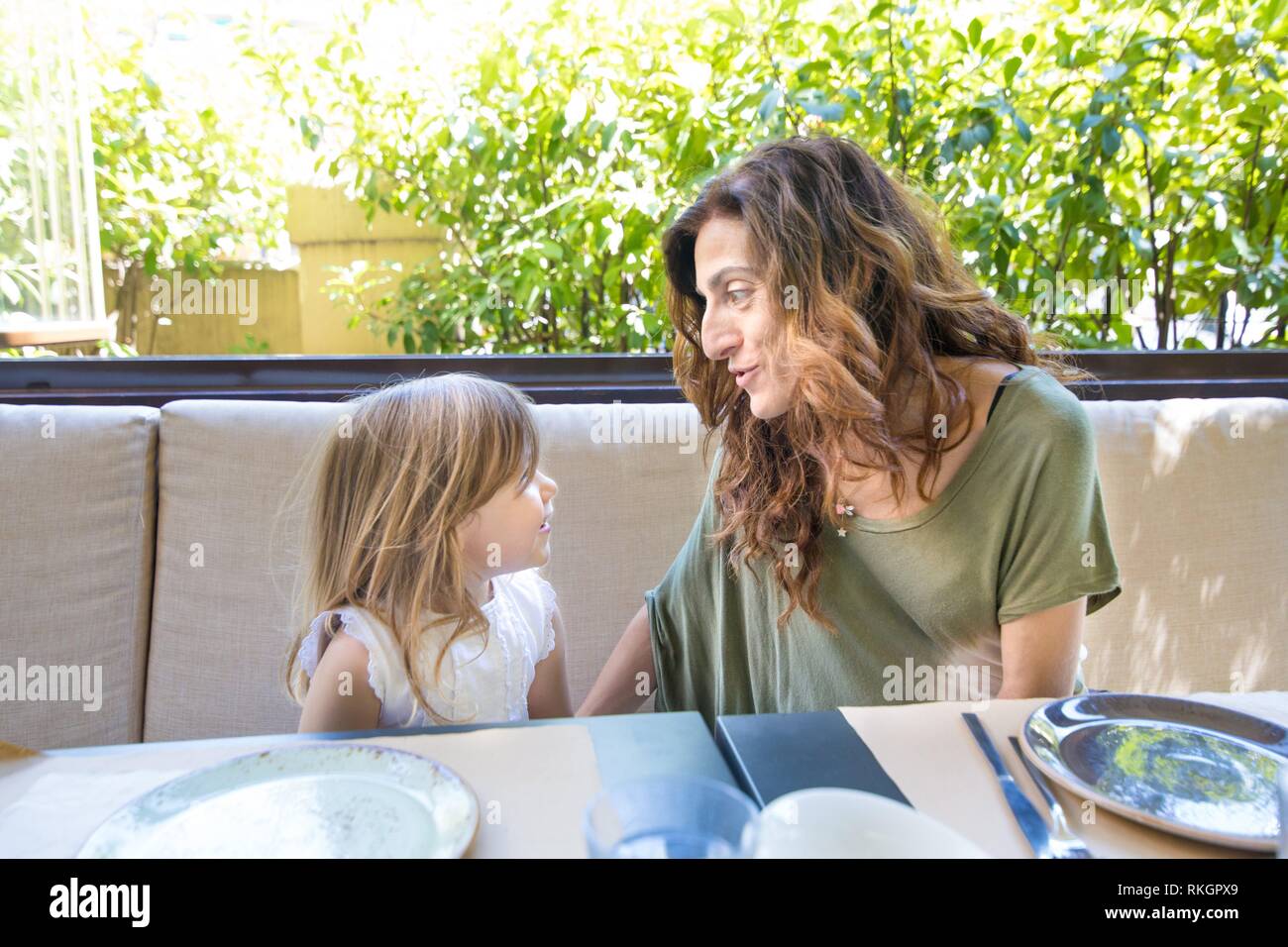 Girl telling fun story hi-res stock photography and images - Alamy