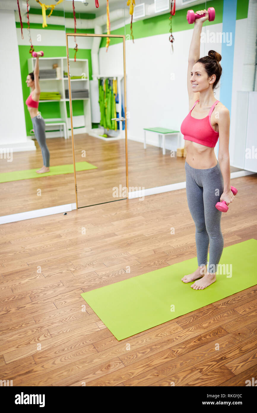 Young woman excercising hi-res stock photography and images - Alamy