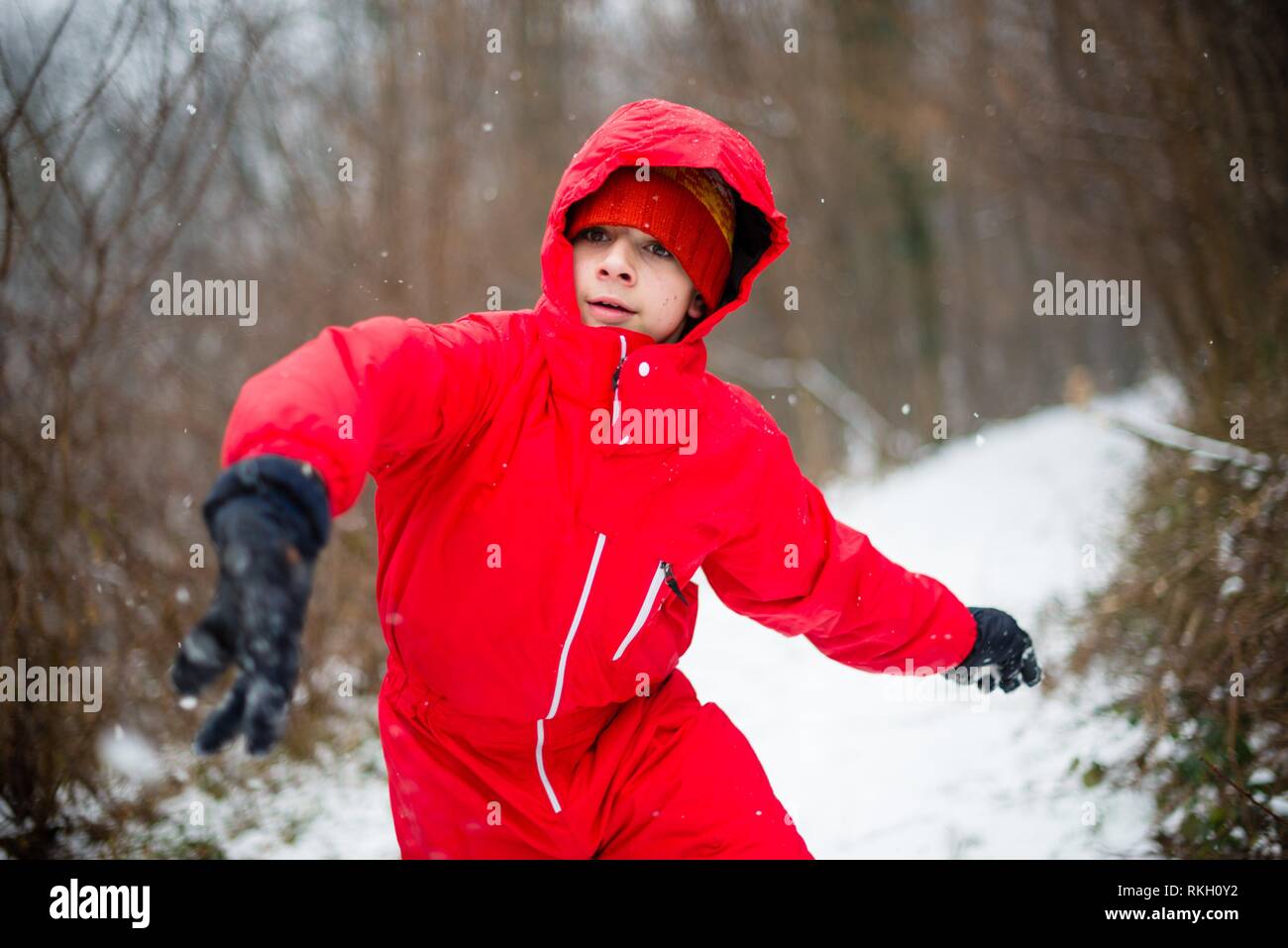 Red snow jacket hi-res stock photography and images - Alamy