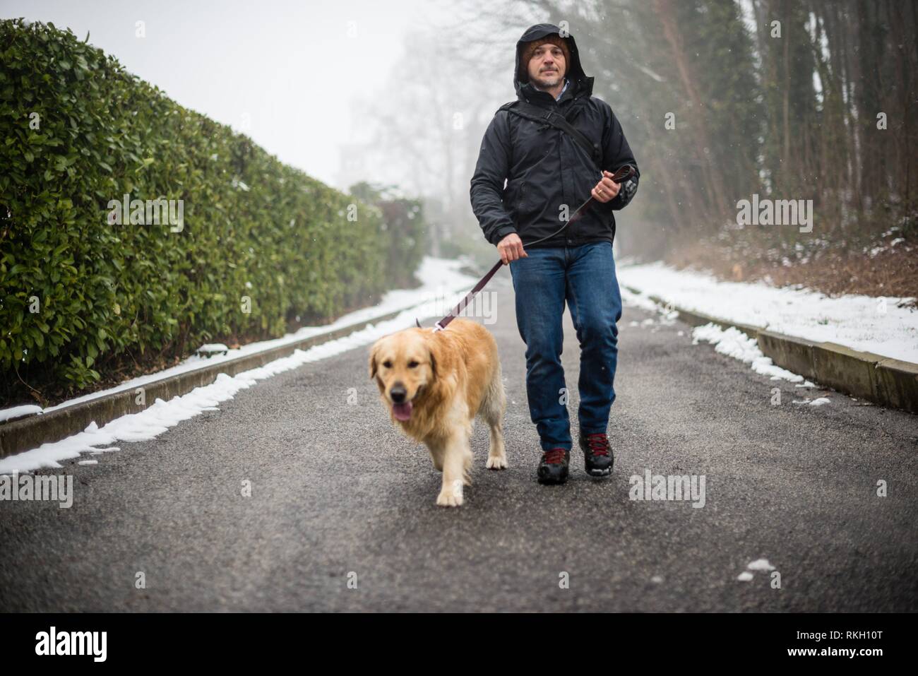 Man on a leash hi-res stock photography and images - Alamy