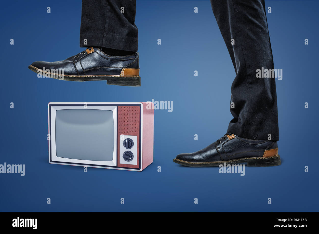 A giant businessman's leg stepping on a small retro TV box with an ...