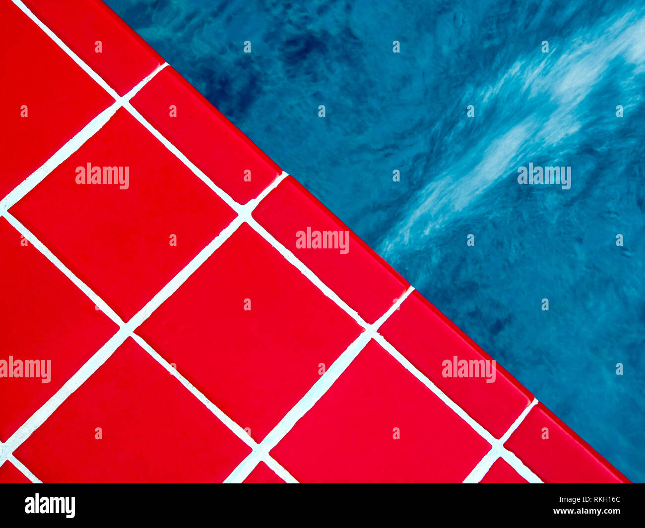 Vivid Red ceramic tile beside the swimming pool Stock Photo - Alamy