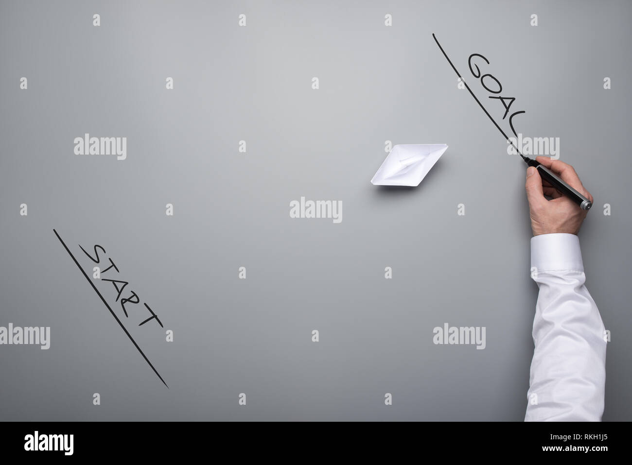 Conceptual image of business vision - origami paper boat floating ...