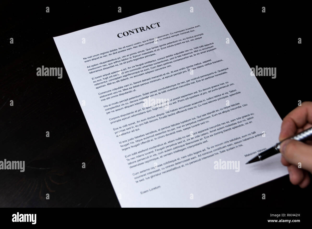 Shot depicting a signing of a legal binding contract between two ...