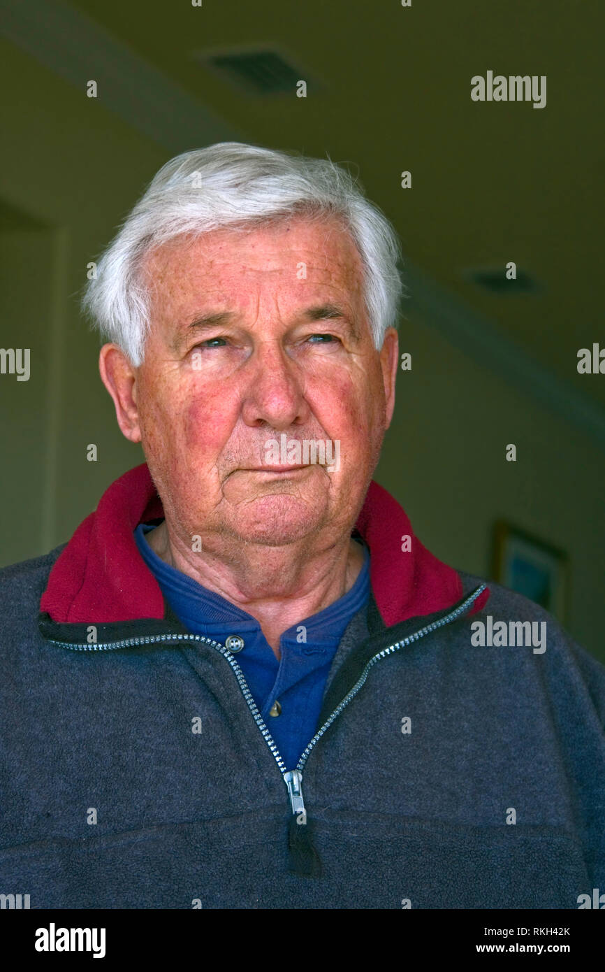 senior man; contemplating; questioning expression; serious, fleece ...