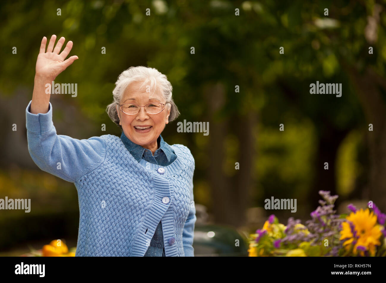 One woman waving arms hi-res stock photography and images - Alamy