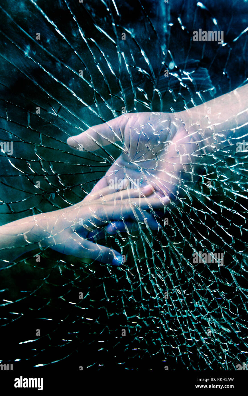 father and child hands touching behind a broken glass Stock Photo - Alamy