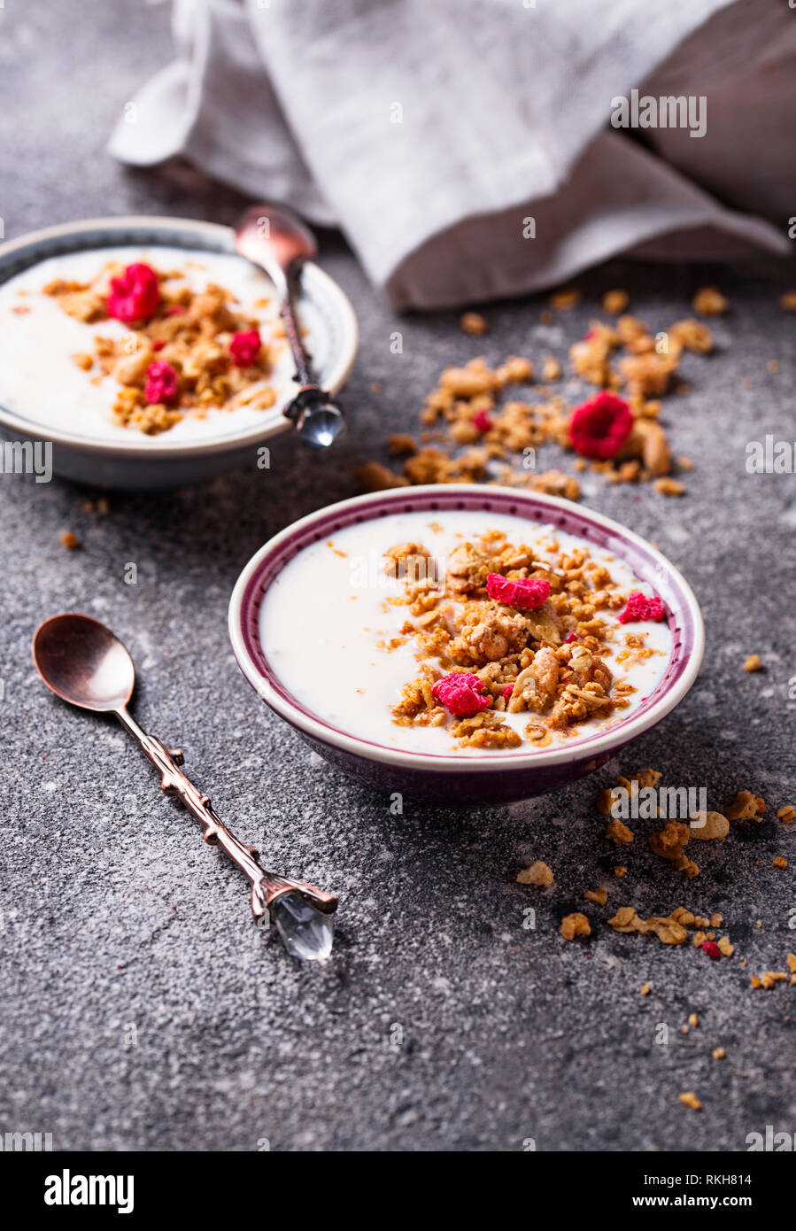 Yogurt with granola and berries Stock Photo - Alamy