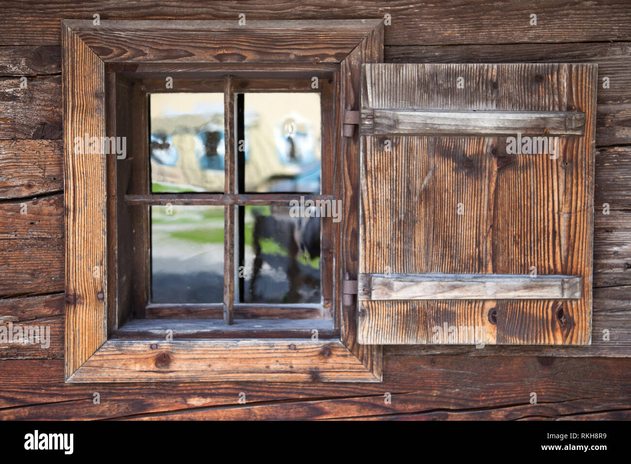 Window with open wooden shutter in an old rural building Stock Photo ...