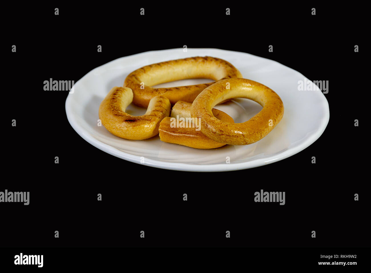 steering-wheels, cookies on a black background, confectionery, baking ...