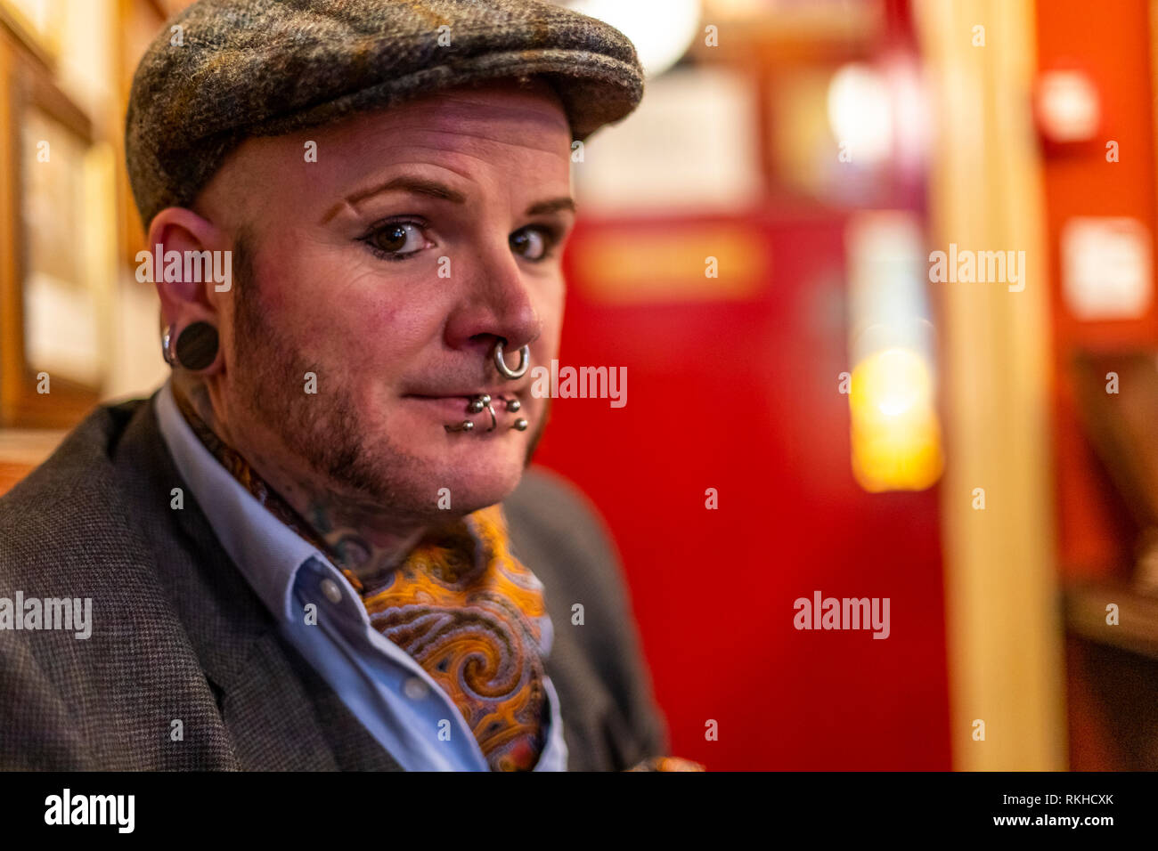 Ian, a customer, poses in The Black Horse pub, Whitby, North Yorkshire ...
